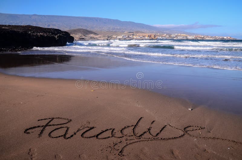 Word Written on the Sand stock photo. Image of tourism - 141831048