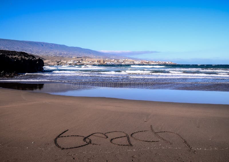 Word Written on the Sand stock photo. Image of coast - 204972850