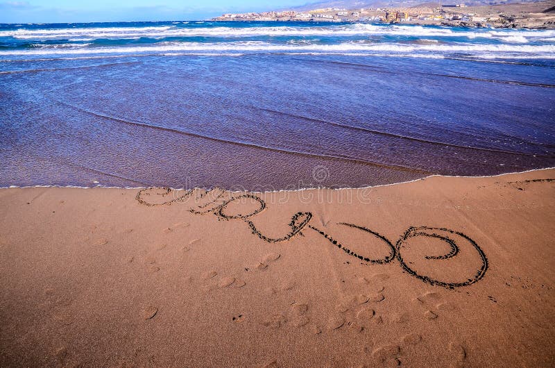 Word Written on the Sand stock photo. Image of landscape - 307574440
