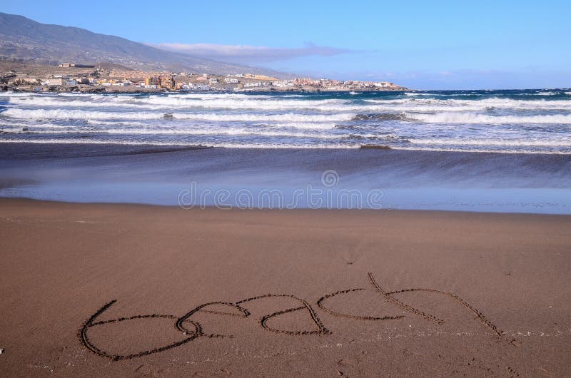 Word Written on the Sand stock image. Image of paradise - 56423863
