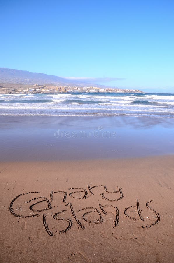 Word Written on the Sand stock photo. Image of beach - 65403810