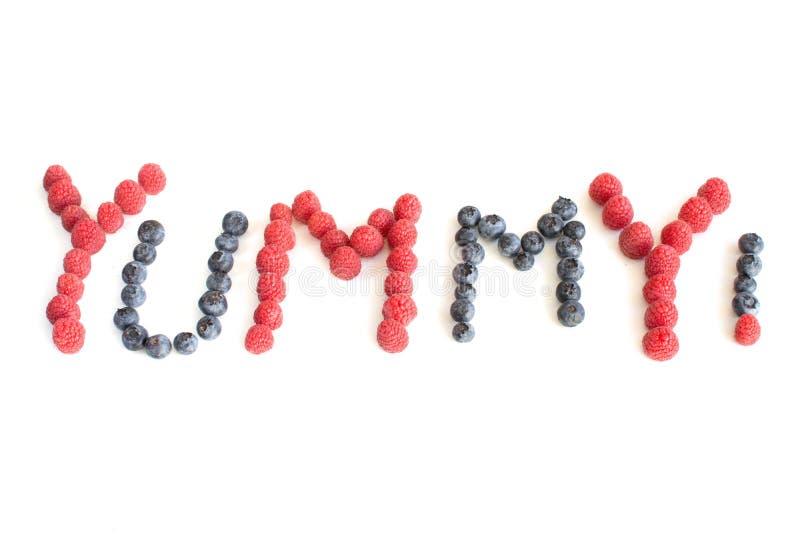 The Word Yummy! Written in Raspberries and Blueberries Stock Photo ...