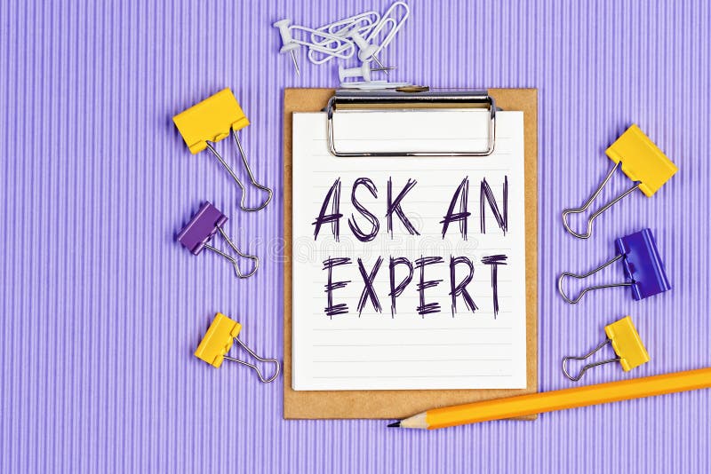 The Words Ask an Expert Written on a White Notebook Stock Photo - Image ...