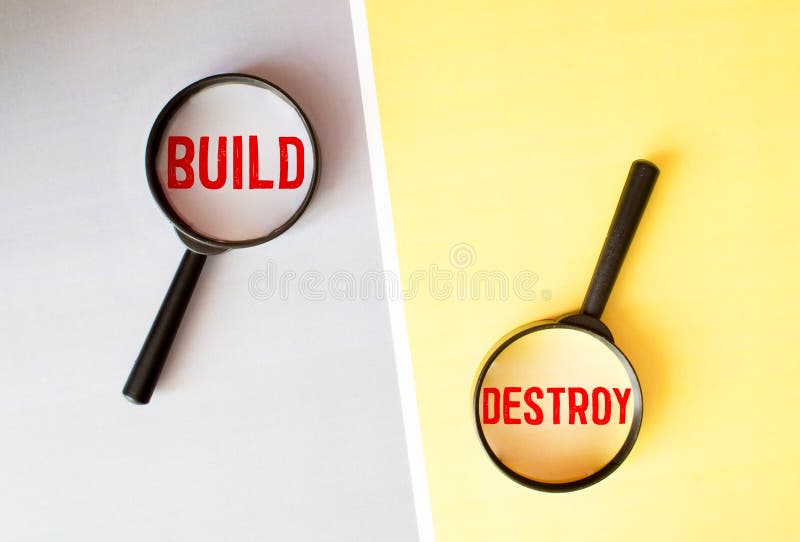 Words Build and Destroy in a Magnifying Glass Stock Image - Image of ...