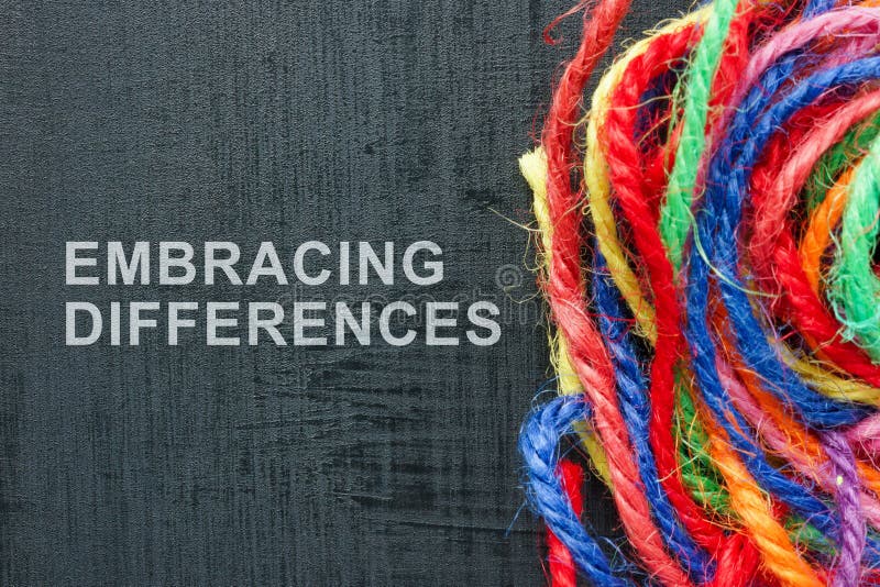 Words Embracing Differences Next To a Ball of Colored Threads. Stock ...