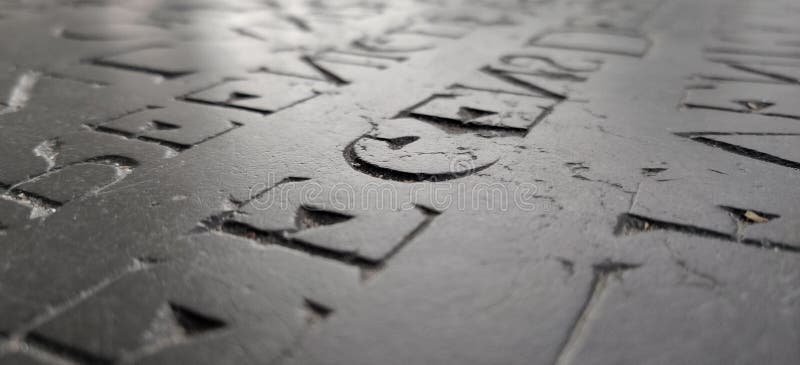 Words Etched in Stone with Dramatic Light. Stock Image - Image of ...