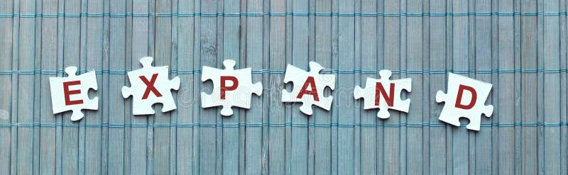 Words EXPAND in the Puzzles Part . Business Concept Stock Photo - Image ...