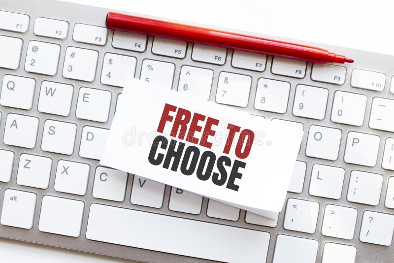 Words FREE TO CHOOSE Written on Torn Paper on a Computer Keyboard Stock ...