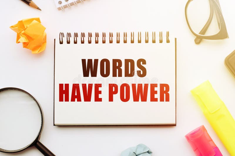 WORDS HAVE POWER. Text in Notebook on White Table with Office Tools ...