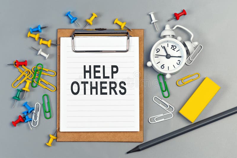 The Words Help Others Written on a White Notebook Stock Image - Image ...