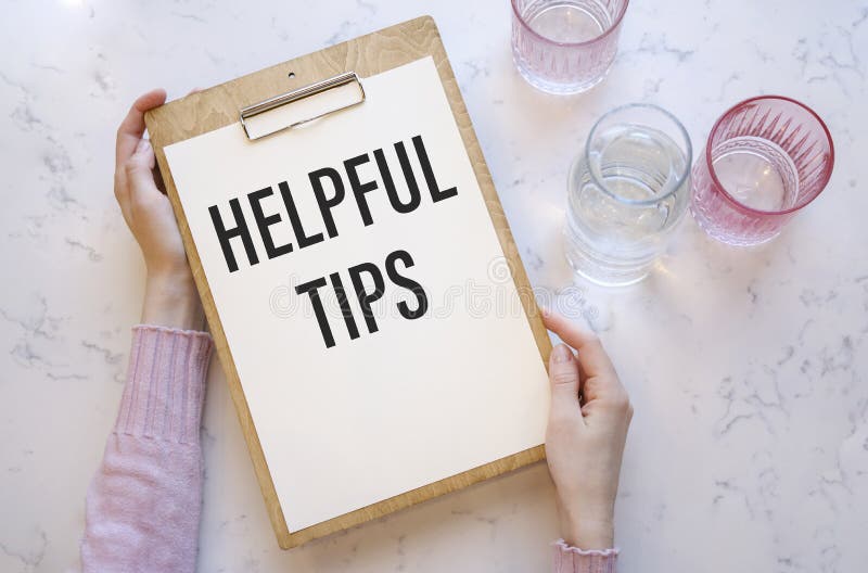 The Words HELPFUL TIPS Written on the Notebook. Notebook in Hand Stock ... The Words HELPFUL TIPS Written on the Notebook. Notebook in Hand Stock ...