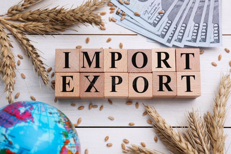 Words Import and Export Made of Cubes, Ears of Wheat, Banknotes with ...