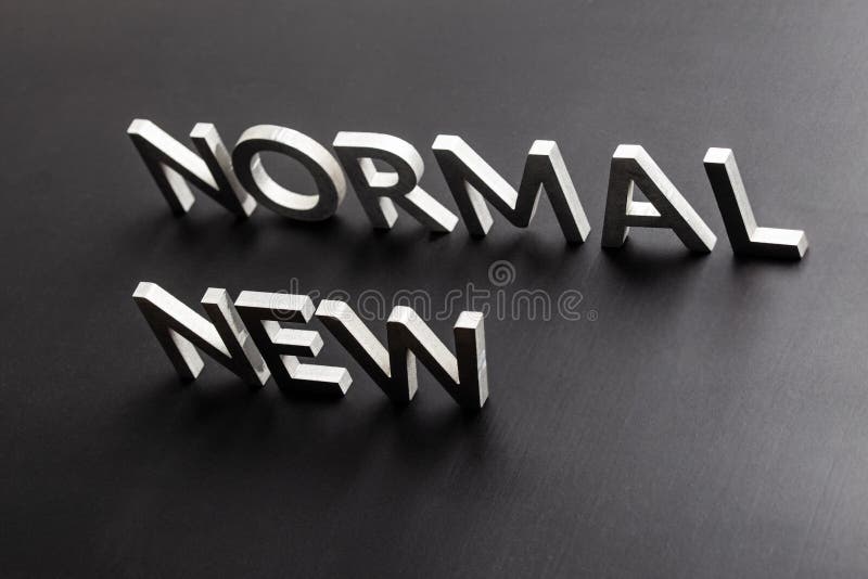 Words New Normal Standing Up on Black Surface in Tilted Linear ...