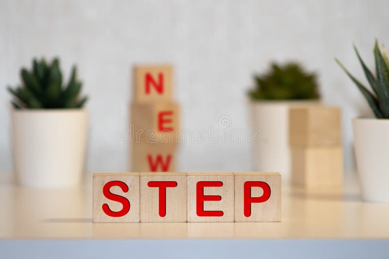 The Words Next Step on Small Wooden Dices on a Table, Close Up Shot ...