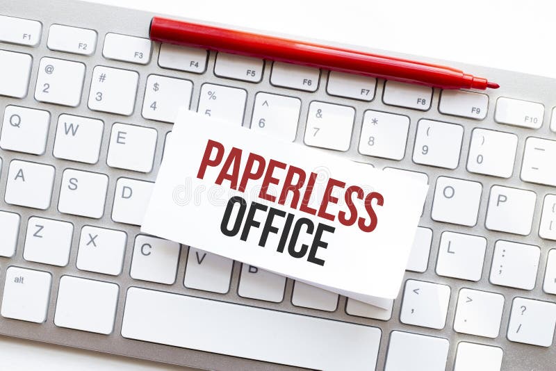 Words PAPERLESS OFFICE Written on Torn Paper on a Computer Keyboard ...