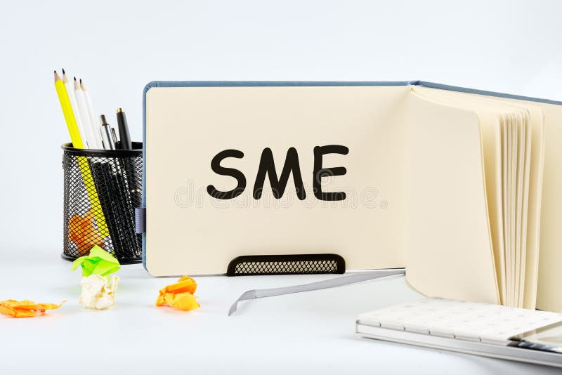 The Words SME Small and Medium Size Enterprises Written in a Notebook ...