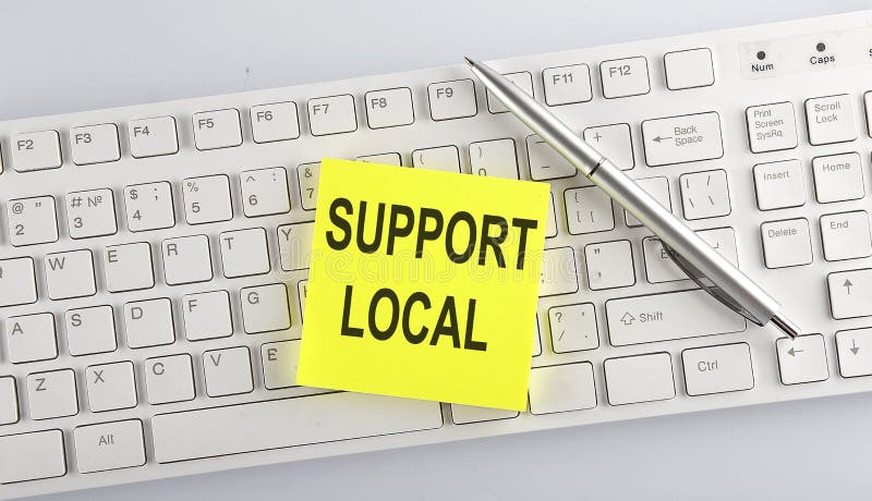 Words SUPPORT LOCAL Written on Stickers on a Computer Keyboard Stock ...