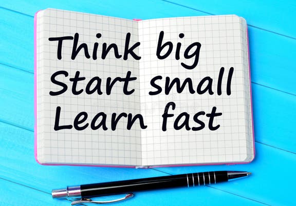 The Words Think Big Start Small Learn Fast on Notebook Stock Photo ...
