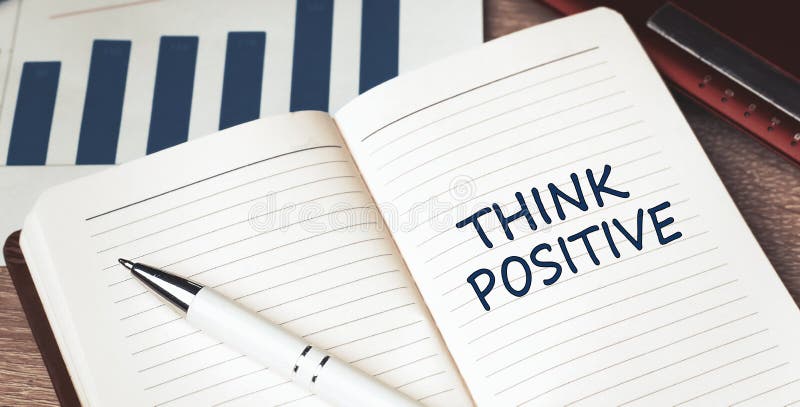 The Words Think Positive Written on a White Notebook. Work and Study ...