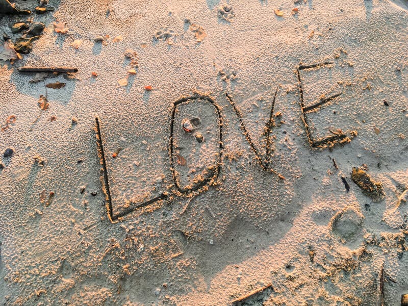 Words Written in the Sand on the Beach by a Man Stock Photo - Image of ...