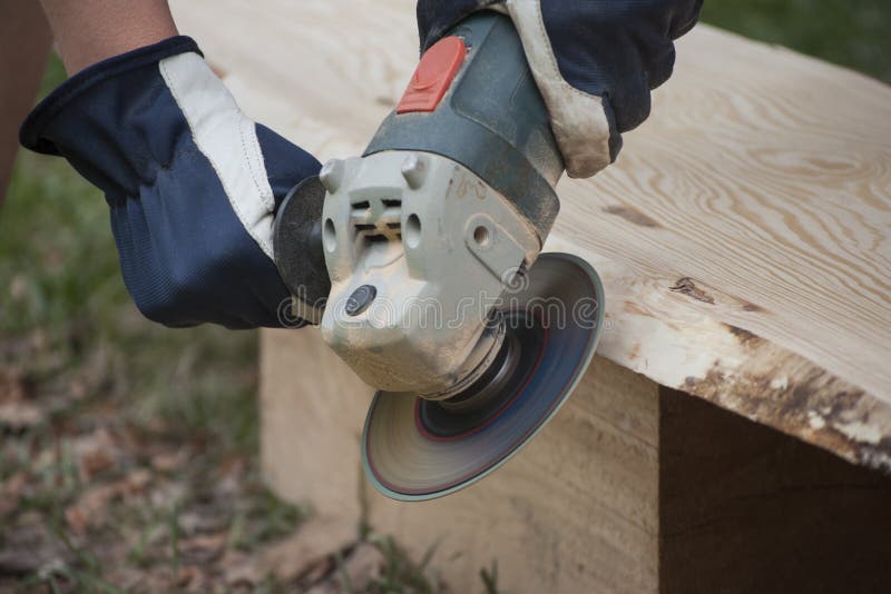 Work with Angle Grinder Machine and Wooden Plank from Pine for Log ...