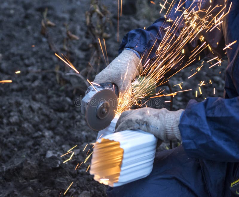 Work With Angle Grinder Machine. Man Is Cutting Metal Stock Image ...