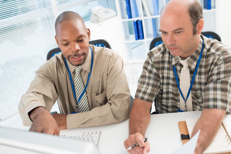 At work stock image. Image of colleagues, angle, concentration - 33739667