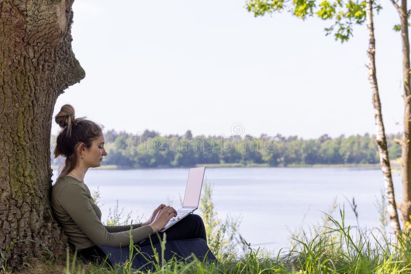 Work from Anywhere. Remote Freelancer Work in Nature Using Renewable ...
