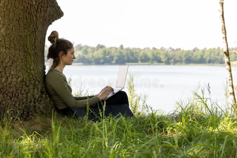Work from Anywhere. Remote Freelancer Work in Nature Using Renewable ...