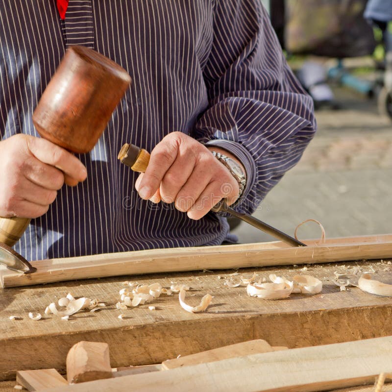 Wood carver at work stock image. Image of hands, create - 10859821