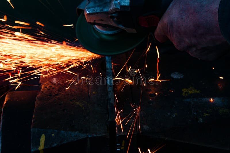 Work As a Grinder, Metal Cutting, Sparks from Metal Cutting Stock Image ...