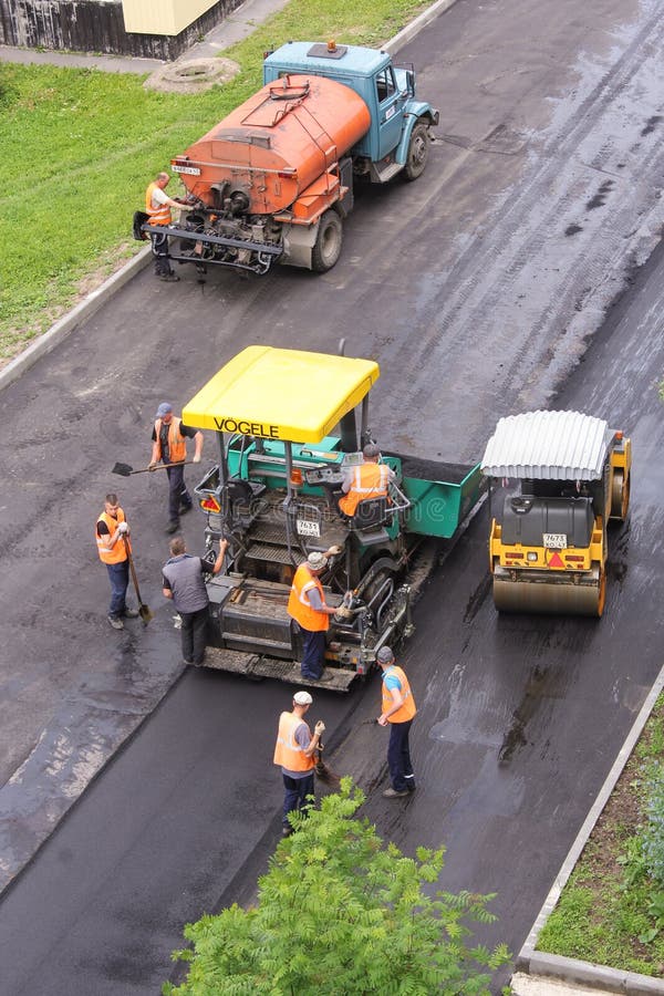 Work on the Asphalt in the Yard. Editorial Photography - Image of ...