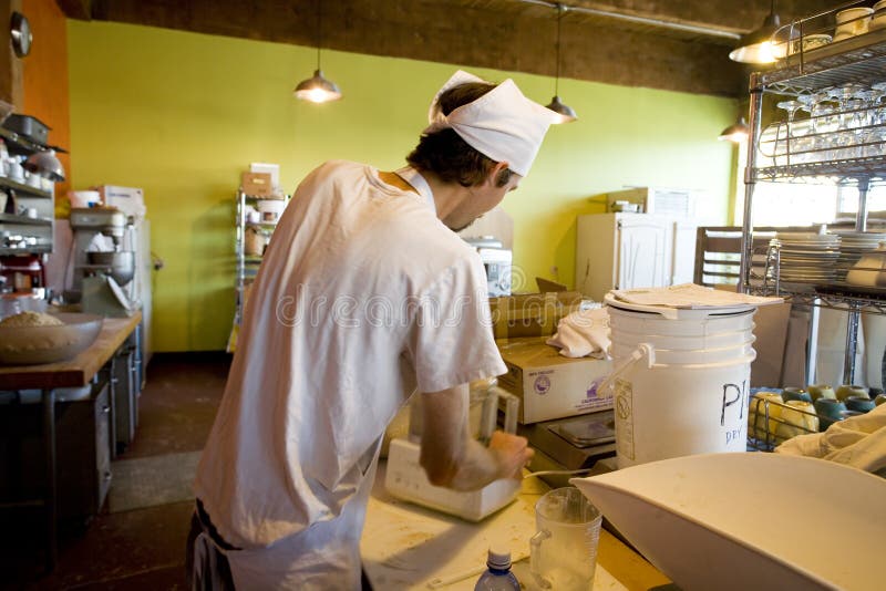 At Work in the Bakery stock image. Image of muffins, bake - 1372189
