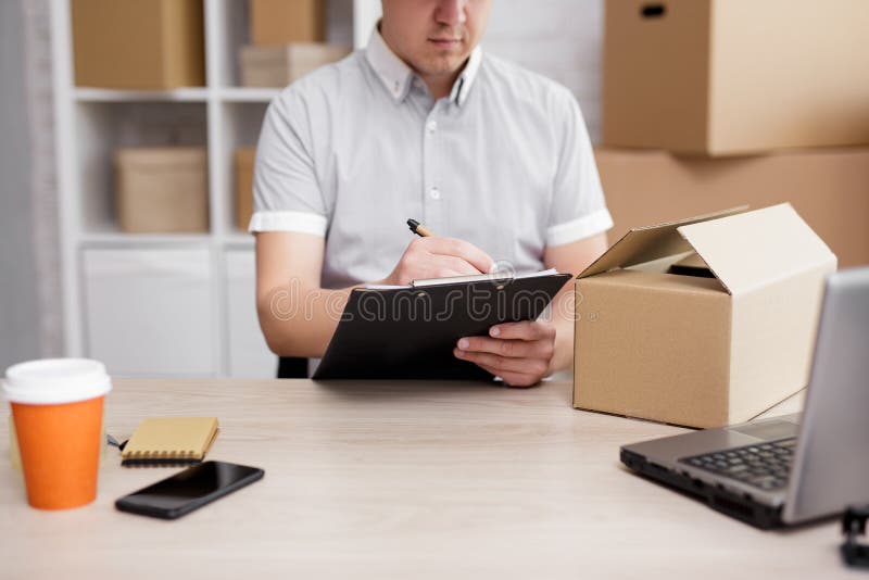 Work, Business and Delivery Concept - Close Up of Postman Working in ...