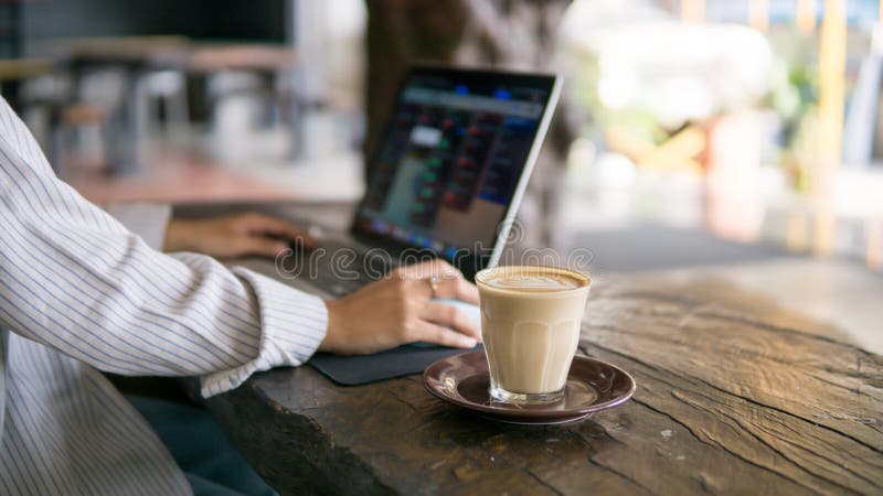 Work from Cafe Using Laptop and Enjoy a Cup of Hot Coffee Stock Image ...