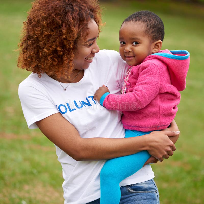 Work for a Cause, Not Applause. Volunteers Working with Little Children ...