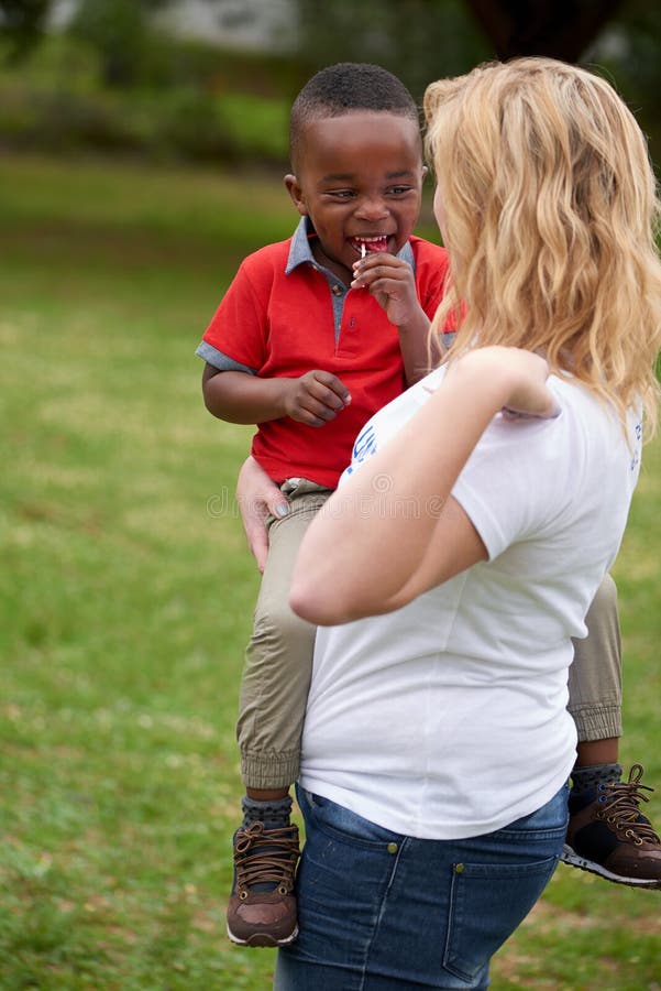 Work for a Cause, Not Applause. Volunteers Working with Little Children ...