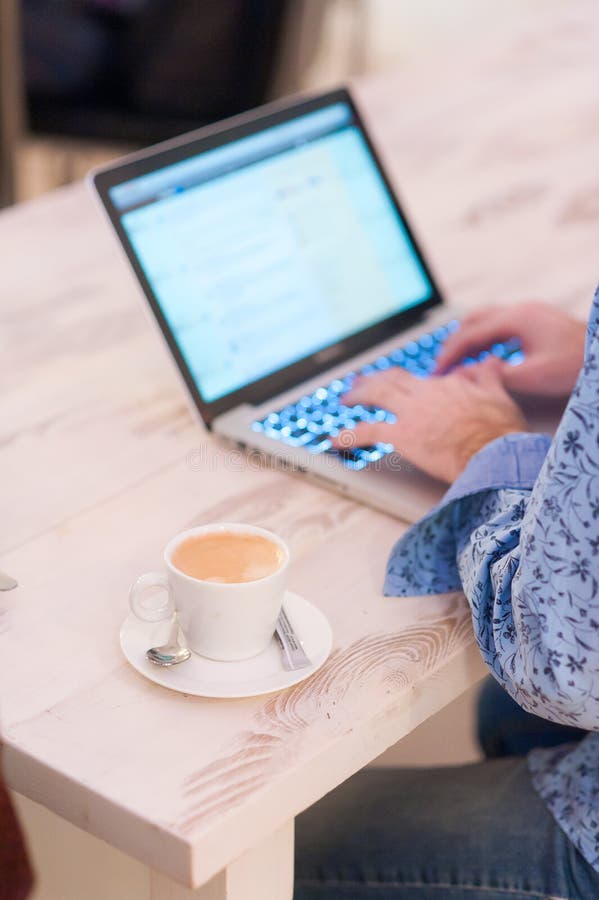Work and coffee stock photo. Image of table, laptop, spoon - 27634528