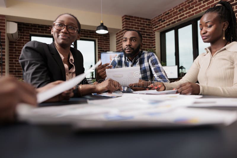 Work Colleagues Brainstorming Ideas To Create Report Stock Image ...