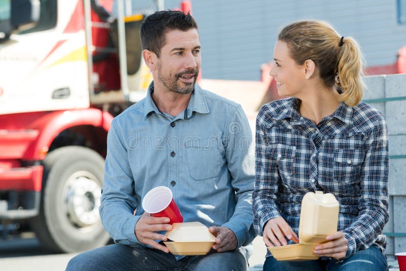 Work Colleagues Eating Takeaway Outdoors Stock Image - Image of dinner ...