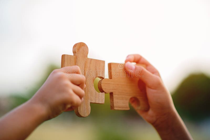 Work Concept, Wooden Puzzles Put Together. Puzzle Piece Teamwork ...
