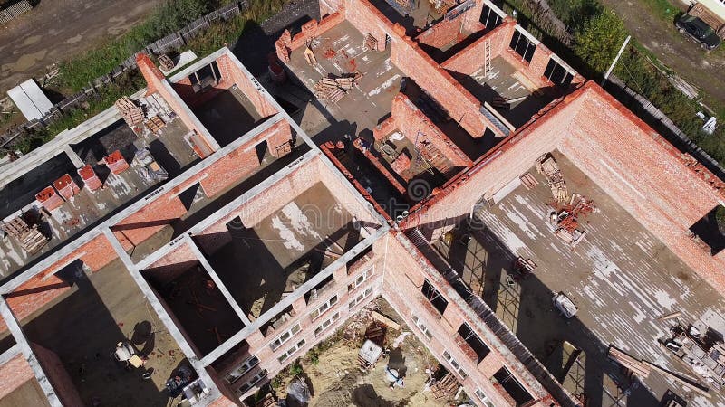 Work on a Construction Site, Building a House. Equipment and Workers ...