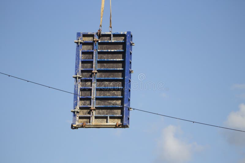 Work at a Construction Site. Moving a Wall with a Crane Stock Image ...