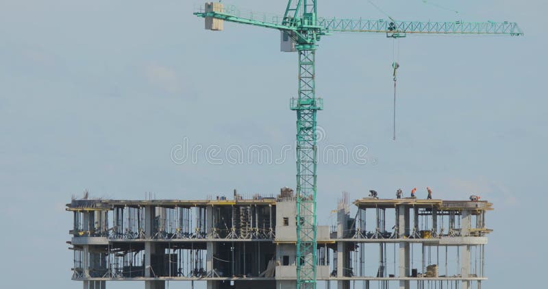 Workers Build House. Construction of a Multi-storey Building. Work at ...