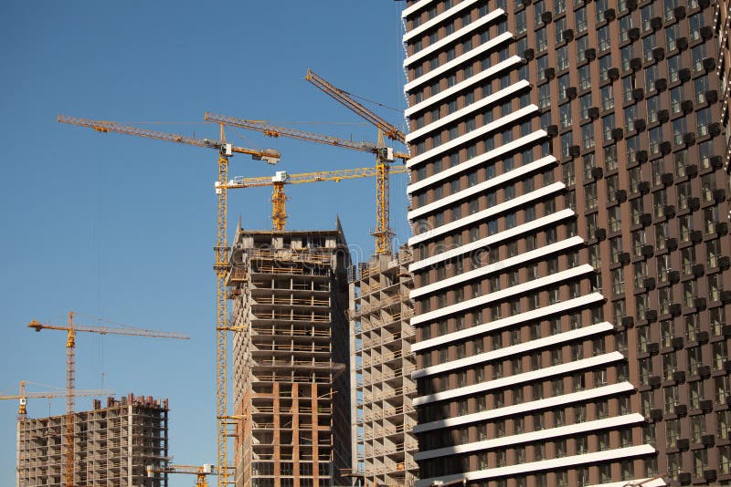 Work on the Construction Site. Unfinished Tall Houses Editorial Stock ...