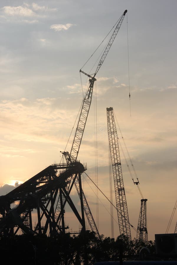 The work of crane stock image. Image of workshop, dusk - 33622265