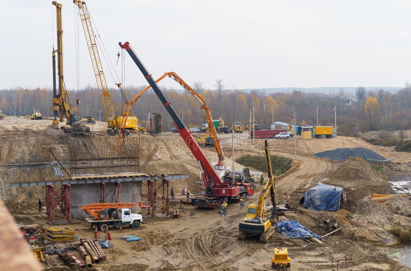 The Work of Cranes and Other Equipment at the Construction Site of the ...