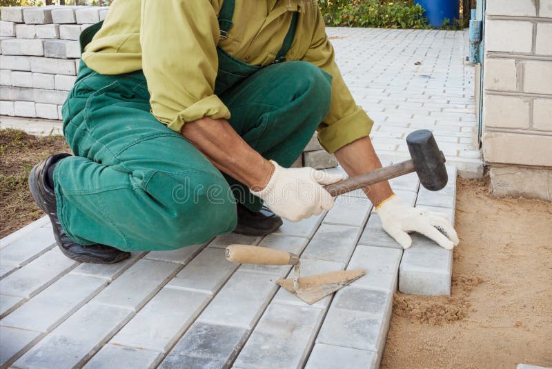 Work on creating sidewalk stock image. Image of flat - 45009319