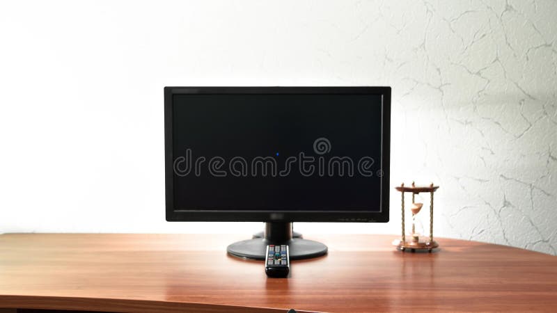 Work Desk for Digital Job with Computer, Hourglass and Remote Control ...