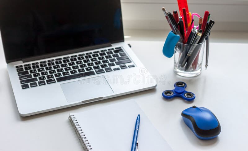Work Desk with Laptop Mouse and Spinner Stock Image - Image of tool ...